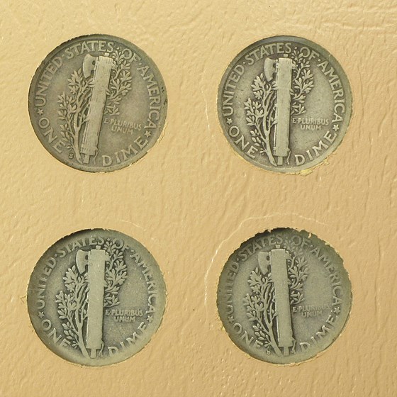 Buy 1916-1945 Near Complete Mercury Dime Set In Dansco Album | APMEX